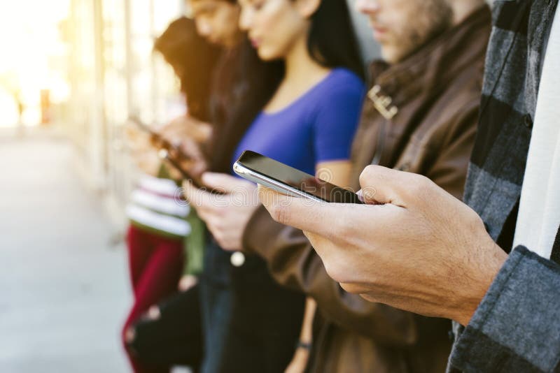 Row of Young Adults on Their Smart Phones - Diversity - Communication ...