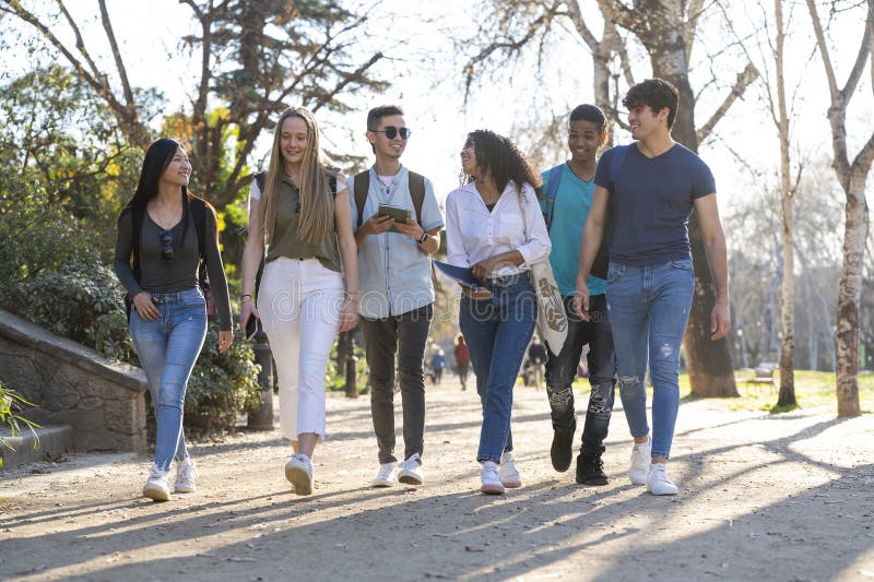 Group of Young Multiracial Students Talking on Some Stairs Stock Photo ...