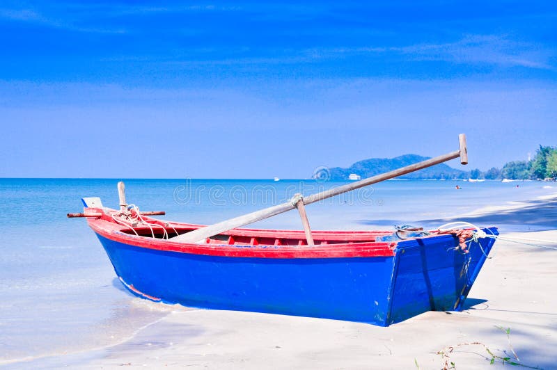 Rowboat on the beach stock photo. Image of england, ocean - 100082338