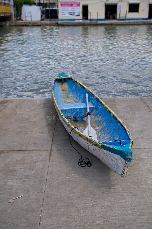 Rowboat with Paddle Docked in Belize City Belize Near the Swing Bridge ...