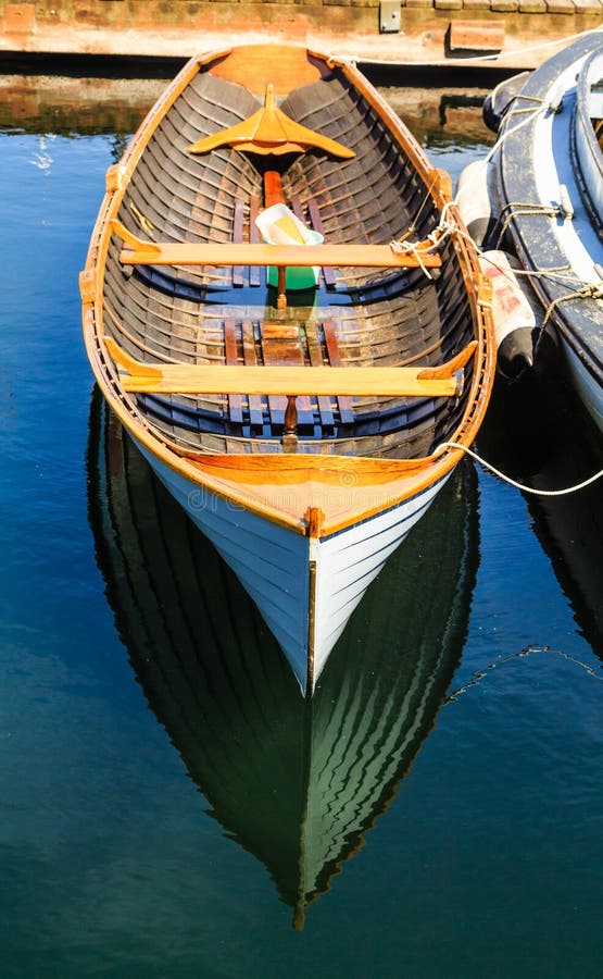 Rowboat and reflection stock image. Image of beautiful - 53183953