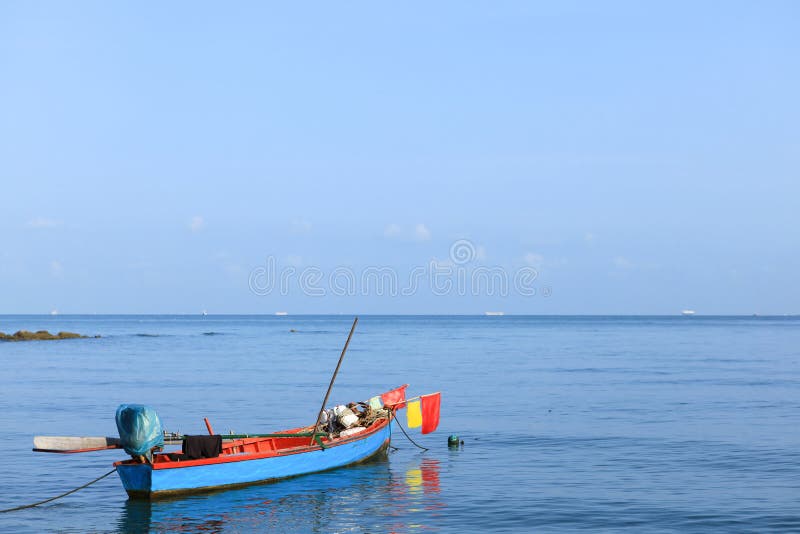 Rowboat in the sea stock image. Image of vessel, wood - 61598229