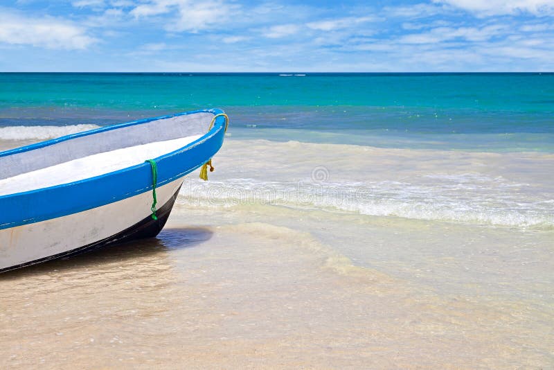 Rowboat in a Tropical Sea stock photo. Image of beach - 28731488