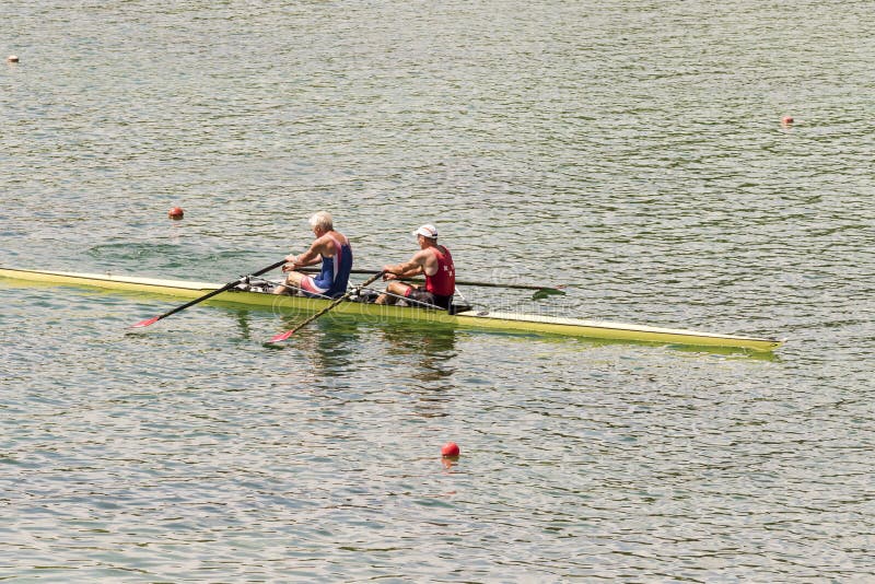 Rowers in Rowing Boats in a Lake Editorial Stock Image - Image of ...