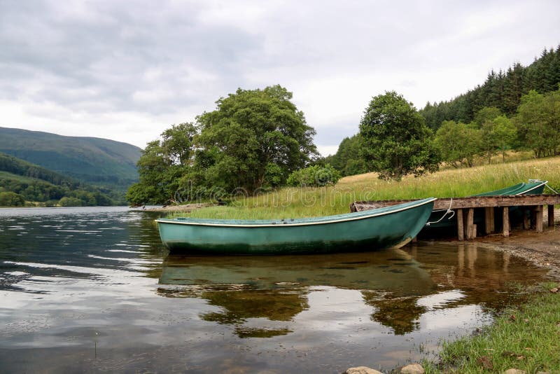 Rowing Boat Moored at a Scottish Loch Stock Image - Image of jetty ...
