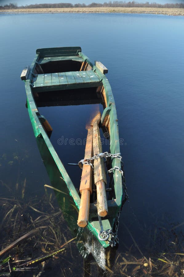 Rowing Boat Moored To the Shore. Spring on the River Stock Image ...