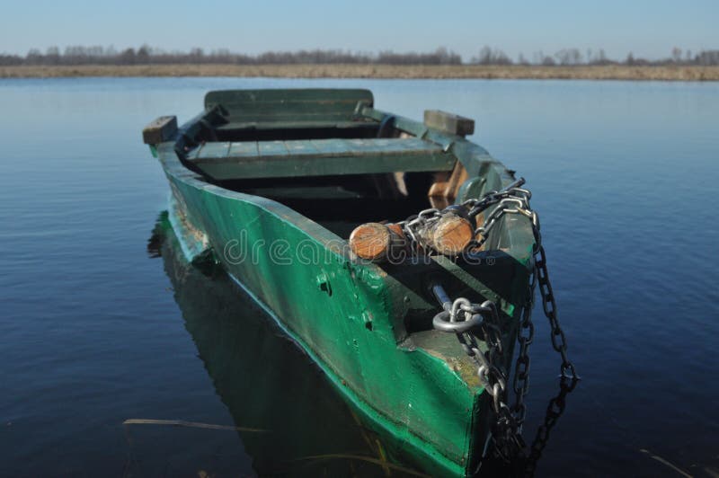 Rowing Boat Moored To the Shore. Spring on the River Stock Image ...