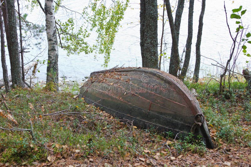 Overturned Rowboat Partly Under Flood Water Stock Image - Image of ...