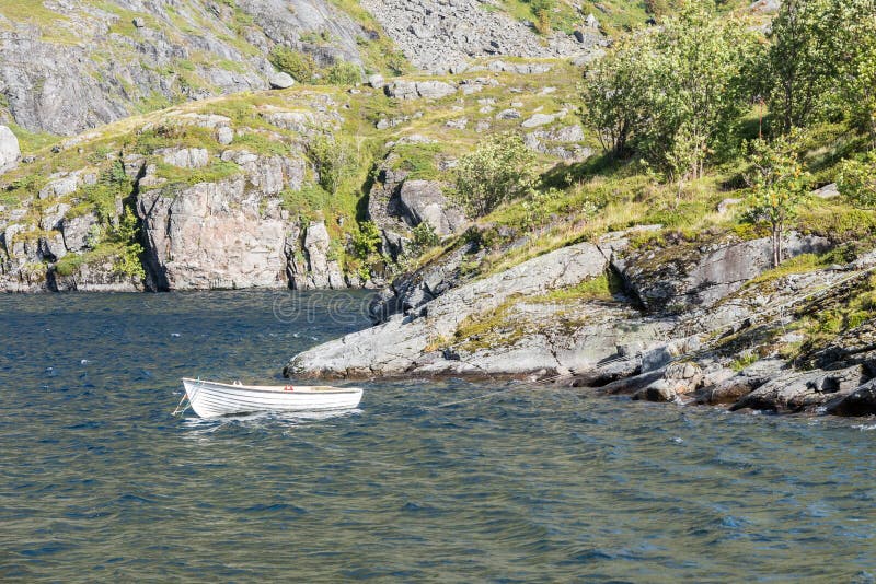 Rowing boat stock photo. Image of serene, waves, boat - 77317736