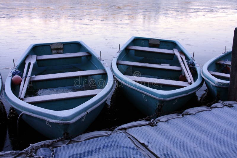Row boat in calm water stock photo. Image of floating - 46014152