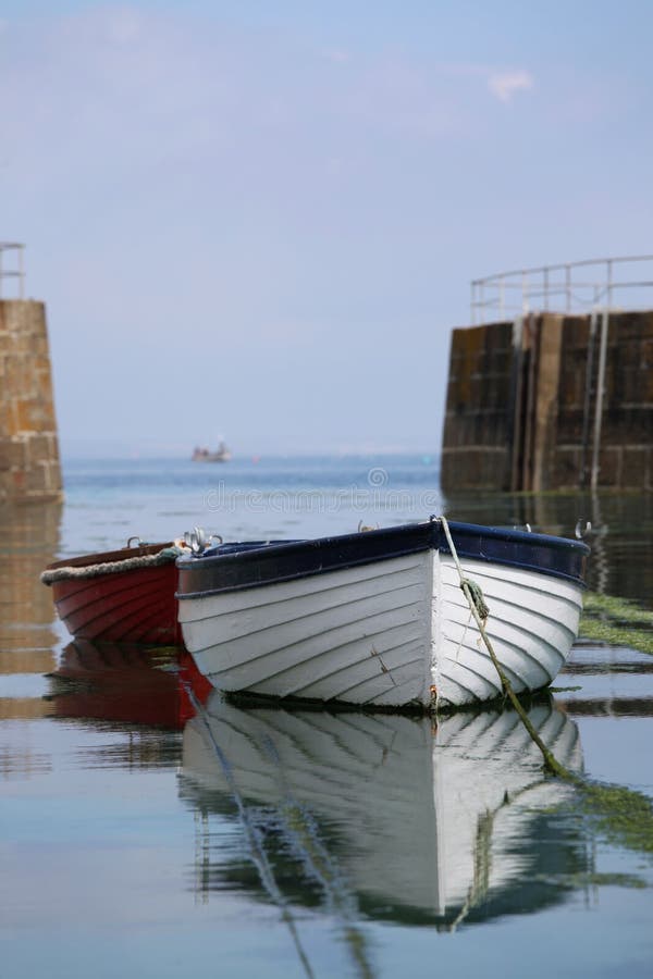 Rowing Boats and Entrance To Mousehole Harbour Stock Image - Image of ...