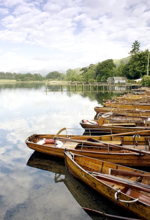 Old Rowing Boats By Sea During Sunset Stock Photo - Image of vessel ...