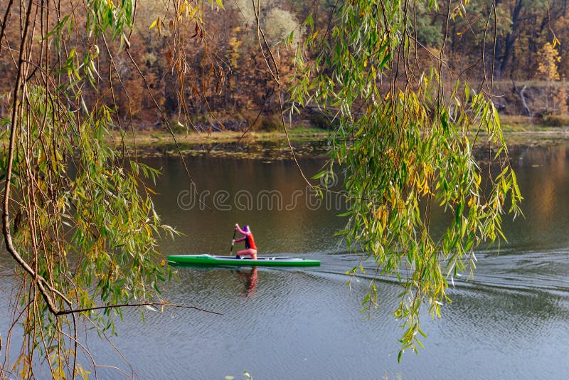 Rowing and Canoe Float Down the River in Autumn Stock Photo - Image of ...