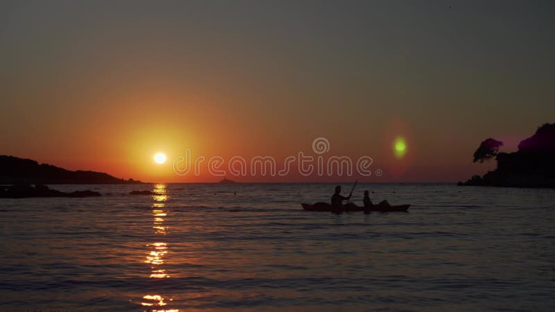 Rowing on a Kayak at Sunset. Stock Footage - Video of nature ...