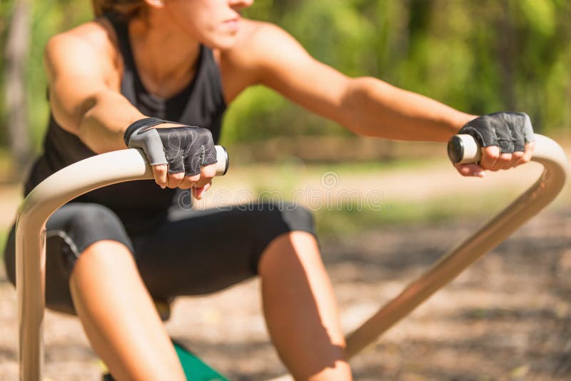 Rowing machine exercise stock image. Image of outdoors - 217339169