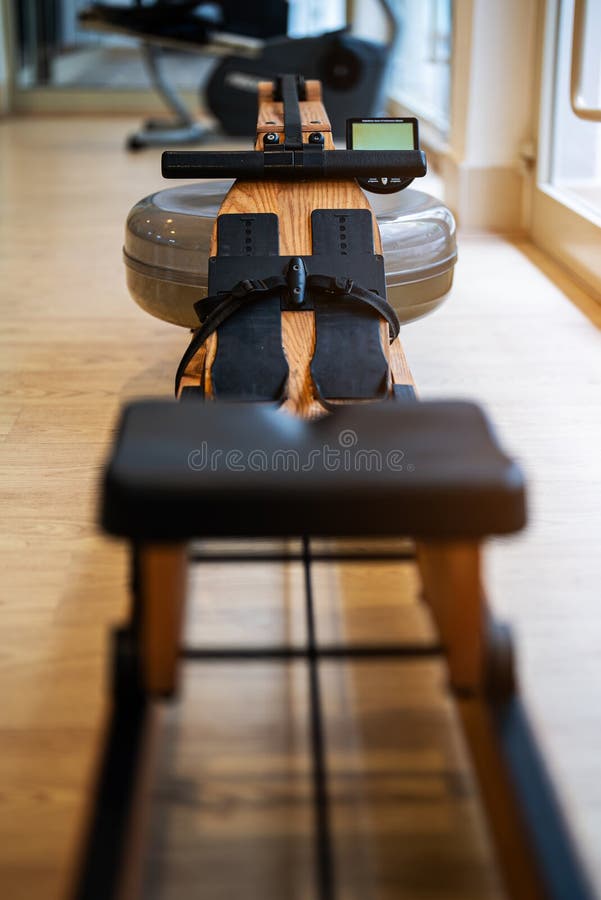 Rowing machine in the gym. stock photo. Image of rower - 340875796