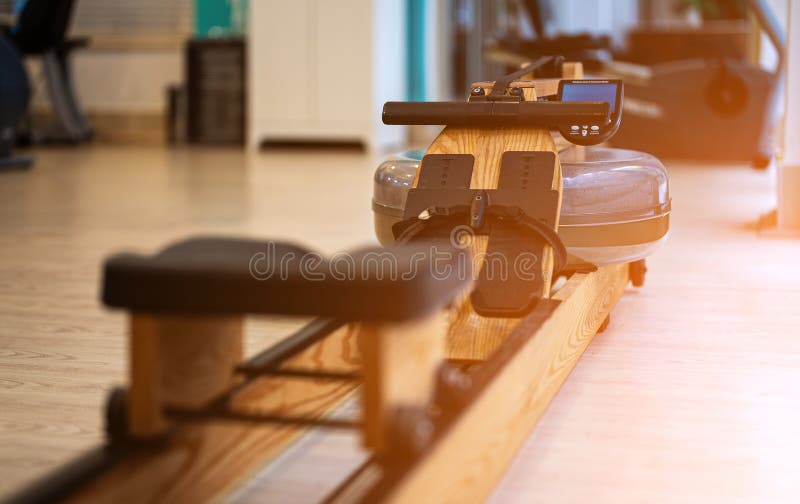 Rowing machine in the gym. stock photo. Image of training - 340875798