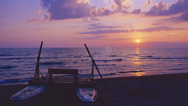 Rowing Rescue Boat on the Beach at Sunset Stock Photo - Image of ...