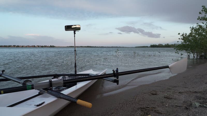 Rowing Shell with Hatchet Oars and Rowing Mirror is Wobbling on a ...