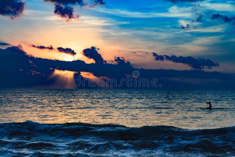 Rowing at Sunset on the Indian Ocean, Western Australia Stock Photo ...