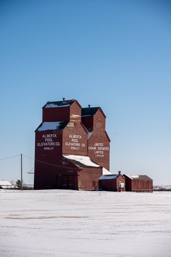 Grain Elevators in the Ghost Town of Rowley in Winter Editorial Photo ...