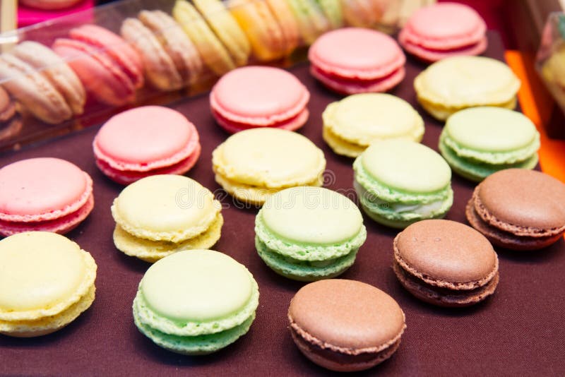 Rows of assorted macaroons stock image. Image of cream - 35689603