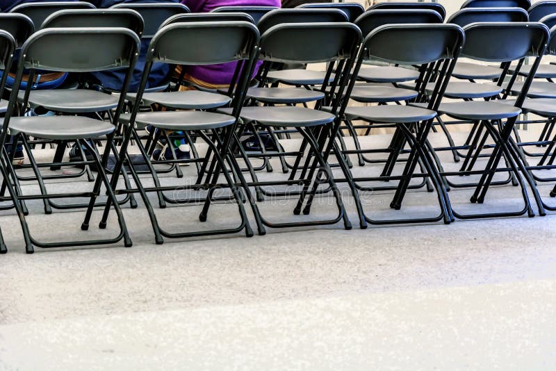 Rows of Black Folding Chairs Stock Photo - Image of auditorium, meeting ...