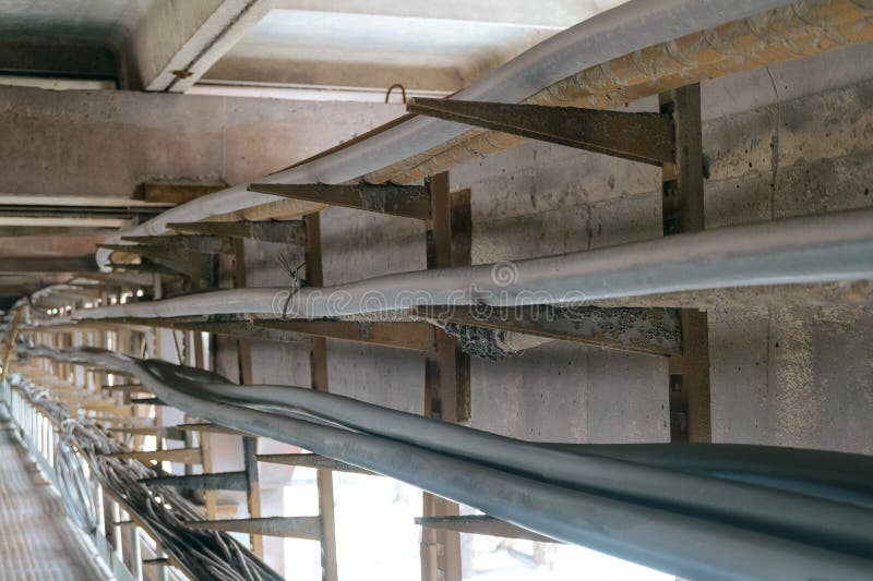 Rows of Cable on a Cable Overpass. Outdoors Industrial Conduit Corridor ...