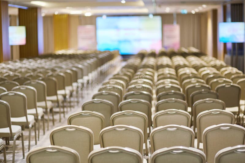 Rows of Chairs in a Conference Room Stock Image - Image of ceiling ...