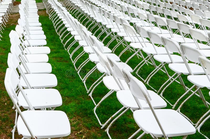 Rows of Chairs Form a Beautiful Pattern on the Grass Land Stock Photo ...