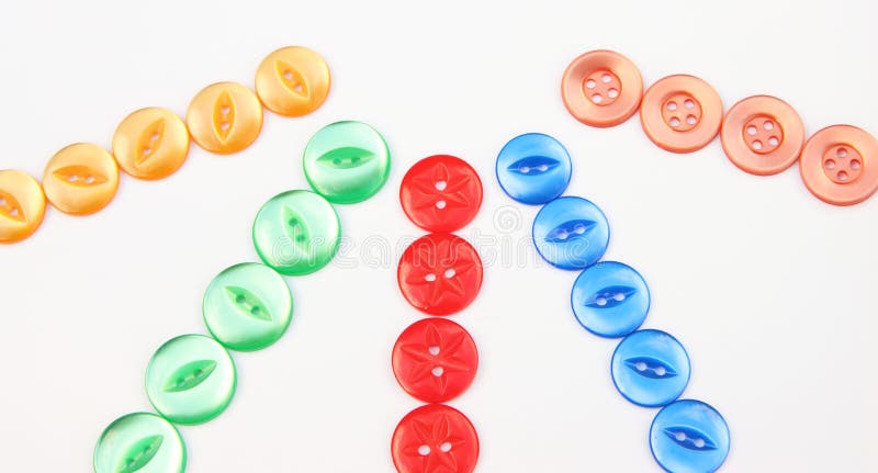 Rows of Colourful buttons stock image. Image of scattered - 196430847