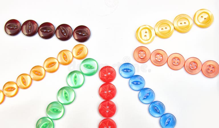 Rows of Colourful buttons stock photo. Image of variety - 196431312