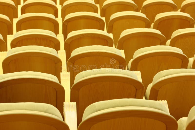 Rows of Comfortable Chairs with Wooden Back Stock Photo - Image of ...