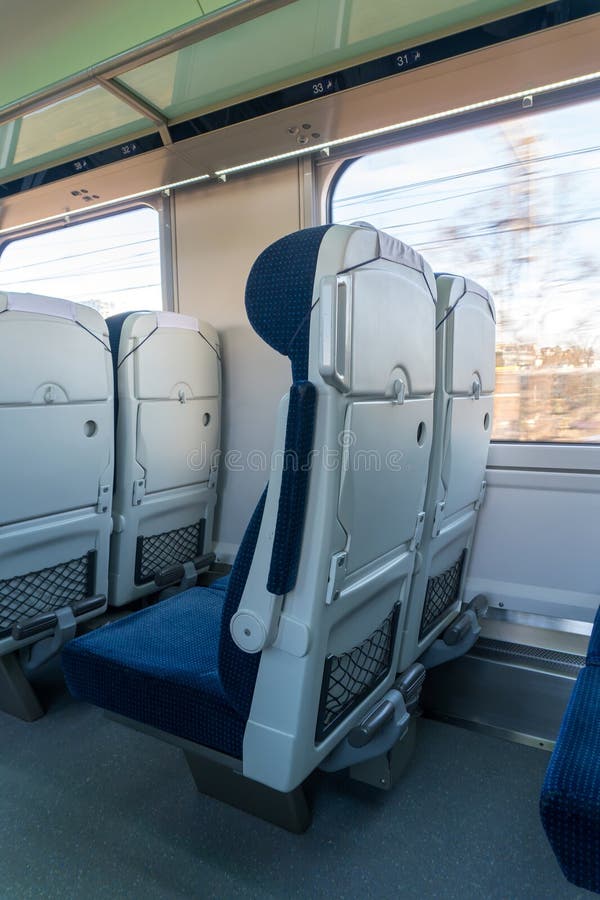Rows of Comfortable, Soft Seats in a Modern Train with Blue Fabric ...