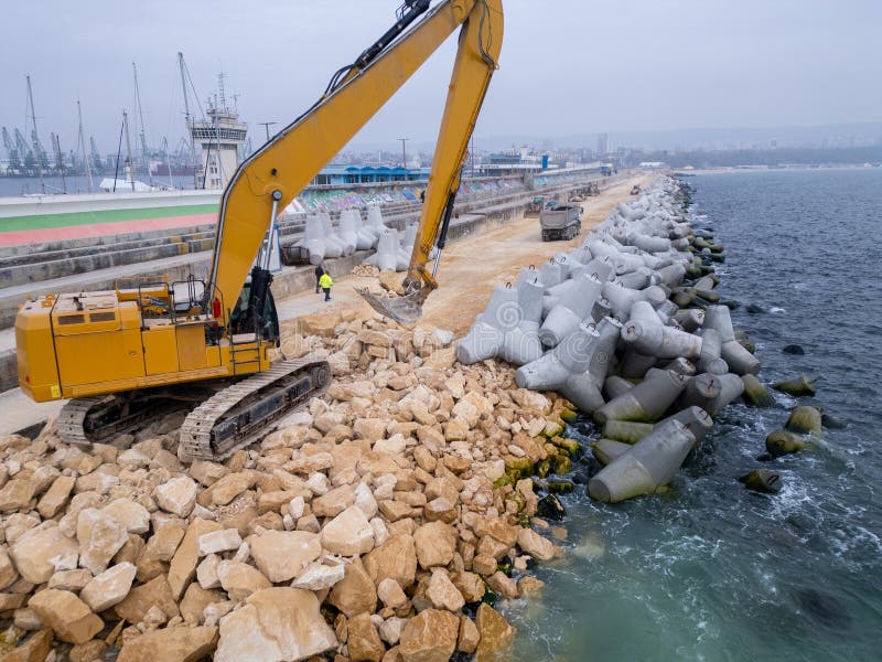 Rows of Concrete Blocks Along Beach Stock Photo - Image of action, rows ...