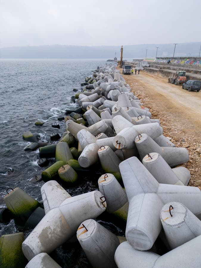 Rows of Concrete Blocks Along Beach Stock Photo - Image of oceanfront ...