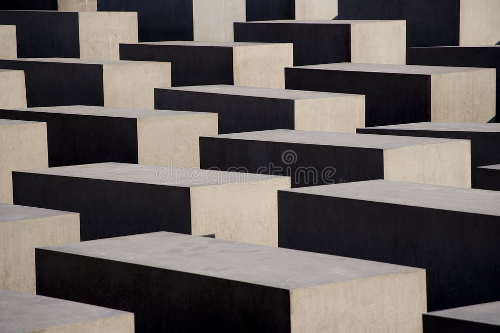 Rows of Concrete Blocks with a Distant Building in the Background ...