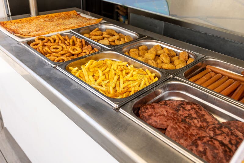 Rows of Delicious Food in the Silver Containers in the Buffet Stock ...