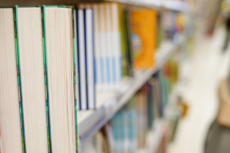 Rows of Different Books on the Shelves in the Modern Urban Bookshop ...