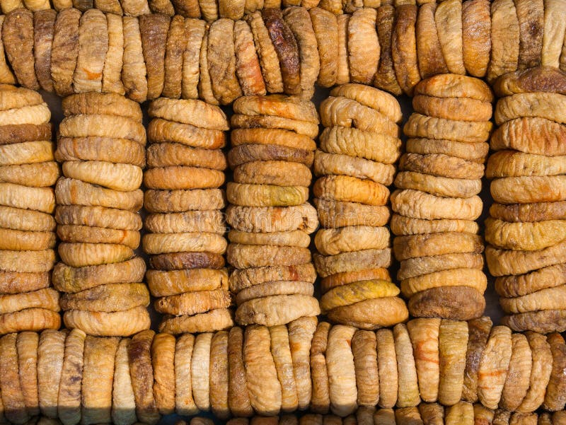 Rows of Dried, Organic, Lerida Figs in a 12.5kg Bulk Supply Box Stock ...