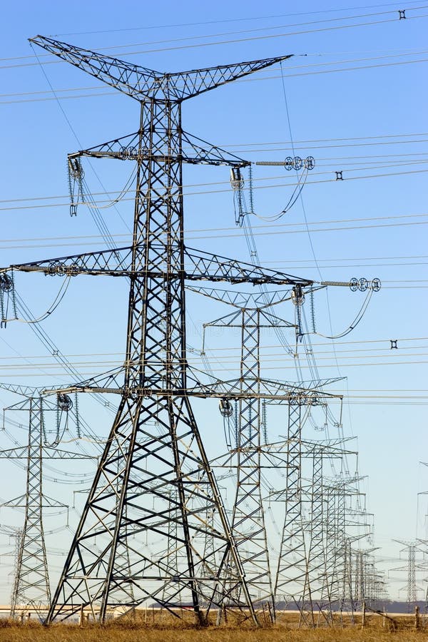 Rows of electrical towers stock photo. Image of giant, large - 754926