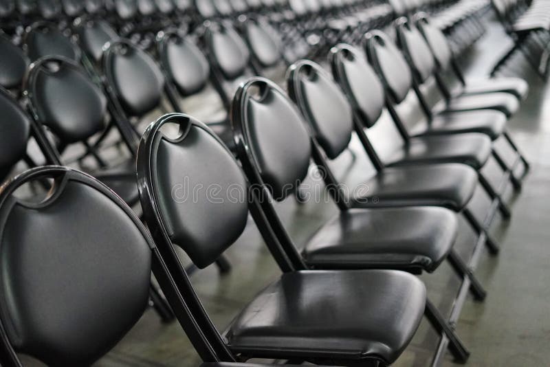 Rows of Empty Black Folding Chairs Stock Image - Image of chairs, seat ...