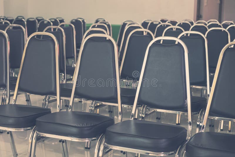 Rows of Empty Black Leather Chairs in a Meeting Room. Stock Photo ...
