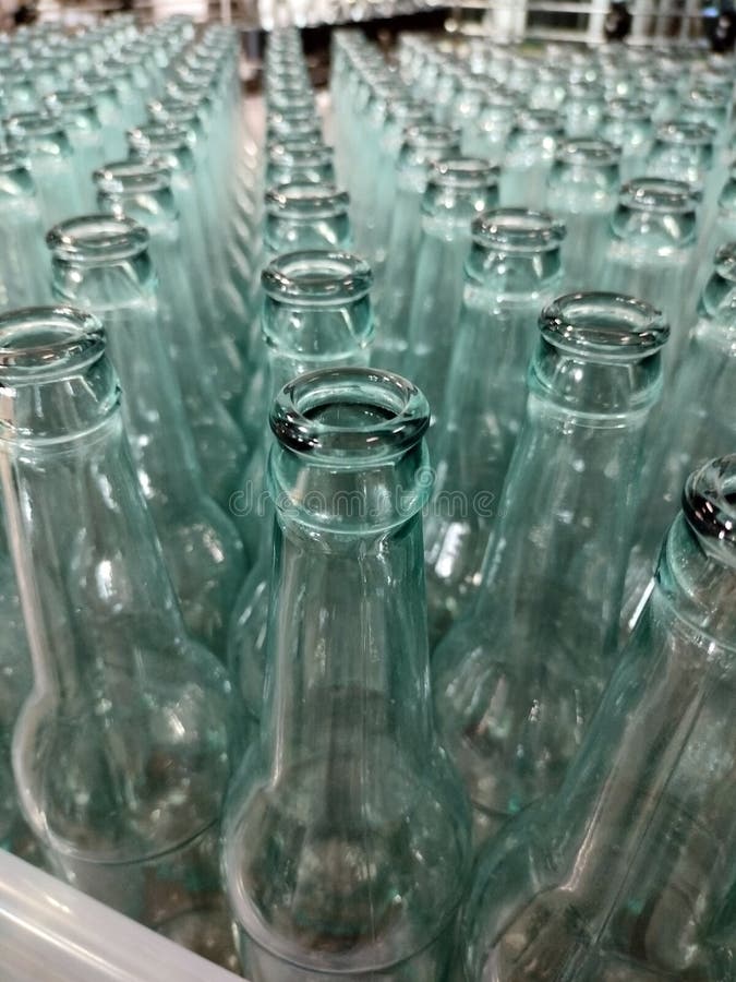 Rows of Empty Bottles in the Beverage Industry Beverage Bottles. Stock ...