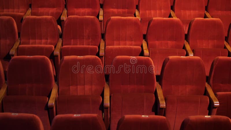 Rows of Empty Bright Spectator Seats in an Empty Hall before the Show ... Rows of Empty Bright Spectator Seats in an Empty Hall before the Show ...