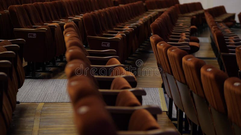 Rows of Empty Bright Spectator Seats in an Empty Hall before the Show ... Rows of Empty Bright Spectator Seats in an Empty Hall before the Show ...
