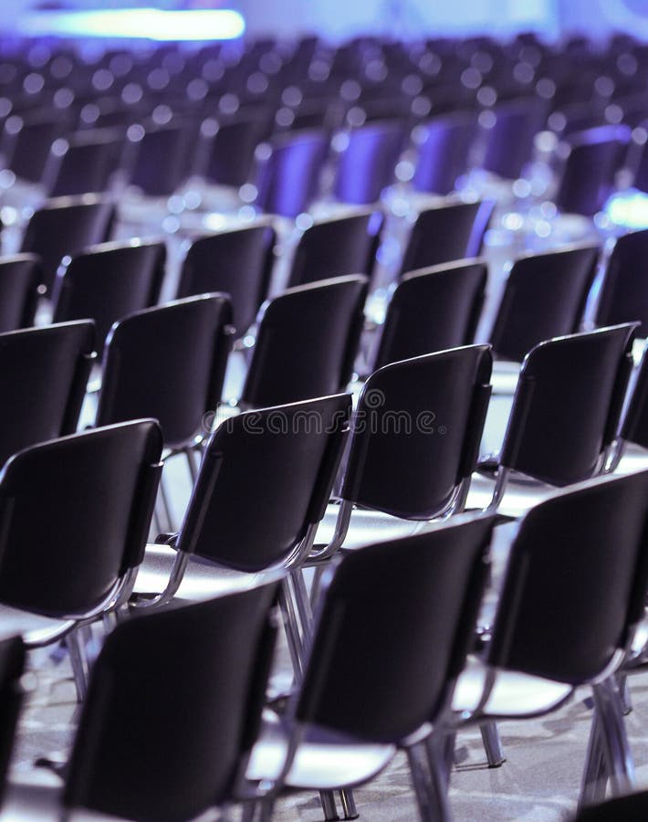 Rows of Empty Plastic Seats in an Empty Conference Room Stock Photo ...