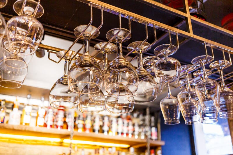 Rows of Empty Wine Glasses on the Bar Counter in the Restaurant or Bar ...