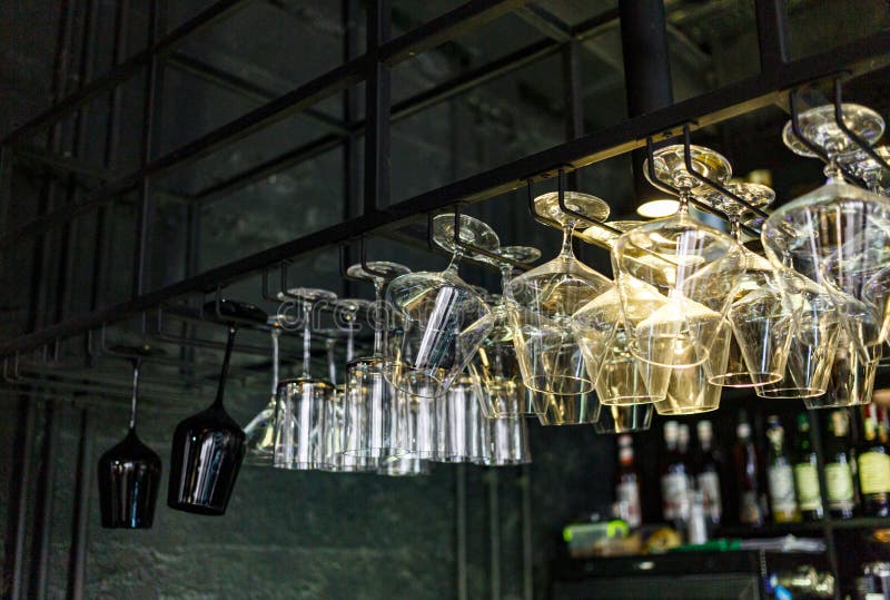 Rows of Empty Wine Glasses on the Bar Counter in the Restaurant or Bar ...