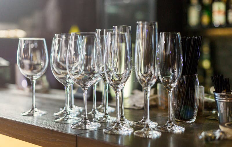 Rows of Empty Wine Glasses on the Bar Counter in the Restaurant or Bar ...